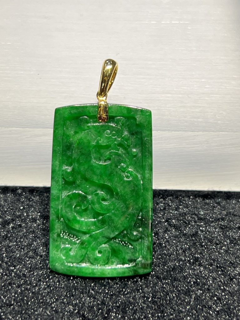 translucent vibrant green dragon and phoenix jadeite pendant - Nanyang ...